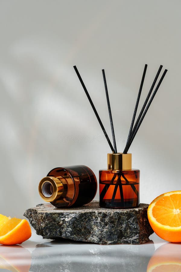 Modern Aromatherapy Diffuser with Orange Accents on a Natural Stone ...