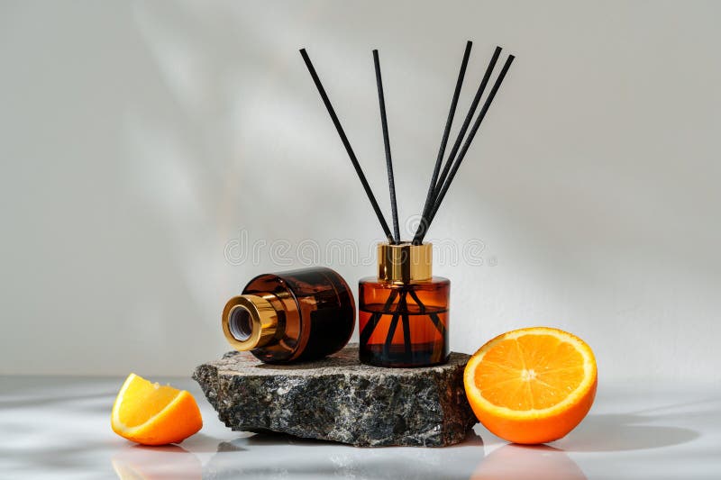 Modern Aromatherapy Diffuser with Orange Accents on a Natural Stone ...