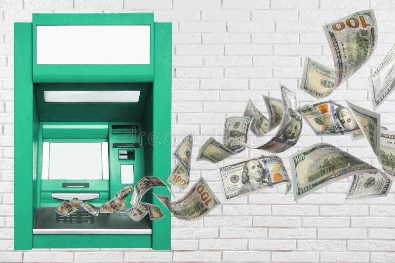 Modern Automated Cash Machine on White Brick Wall and Flying Money ...