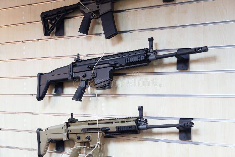 Modern Automatic Rifles on the Window of the Gun Shop Stock Photo ...
