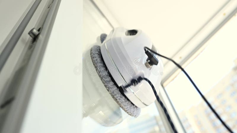 Modern Automatic Robot Window Cleaner Washes Windows. Stock Footage ...