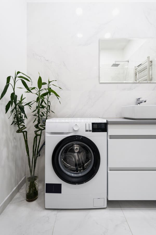 Modern and Automatic Washing Machine in Bathroom Stock Photo - Image of ...