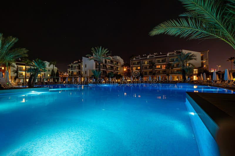 Modern backyard water pool stock photo. Image of night - 328670134