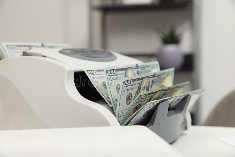Modern Banknote Counter with Money on White Table Indoors, Closeup ...
