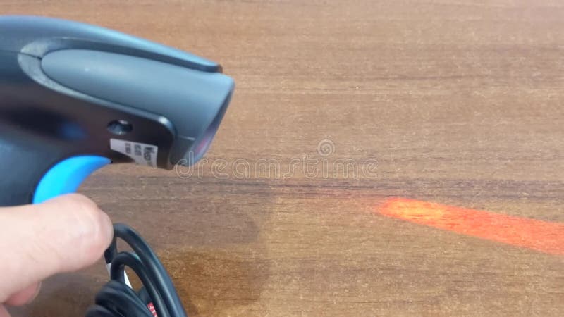 A Modern Bar Code Scanner for Commerce. Working with the Scanner Stock ...