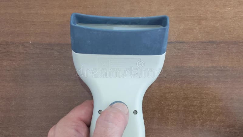 A Modern Bar Code Scanner for Commerce. Working with the Scanner Stock ...