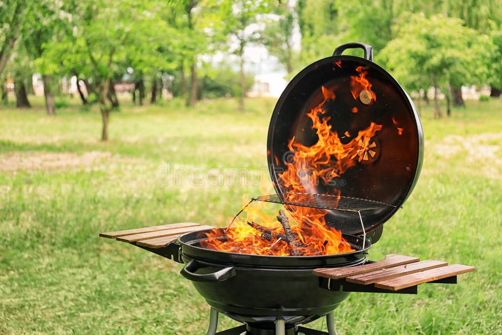 Barbecue Grill with Fire Flames Outdoors Stock Photo - Image of ...