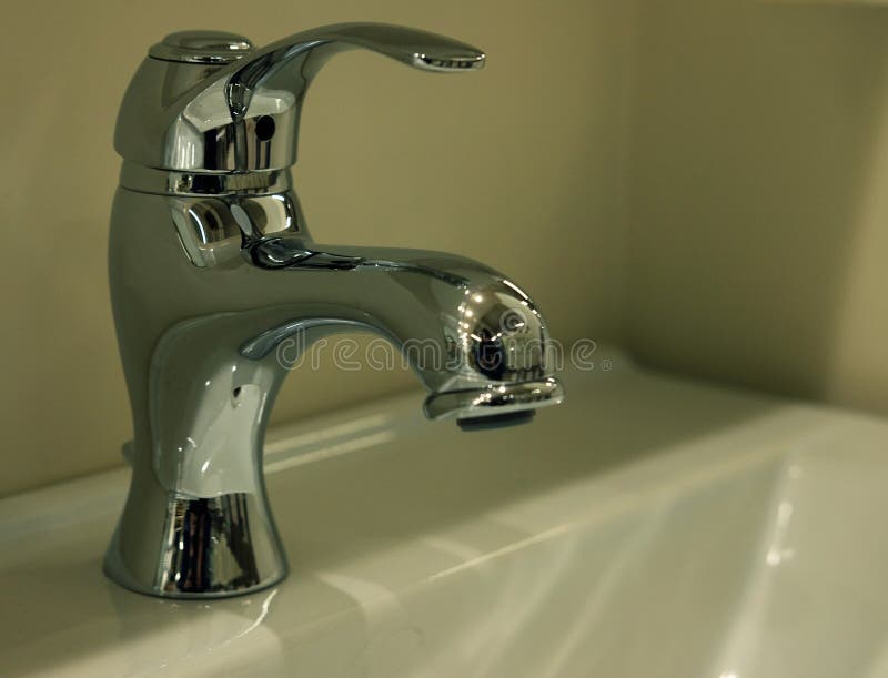 Modern bathroom faucet stock image. Image of store, bathroom - 142171509