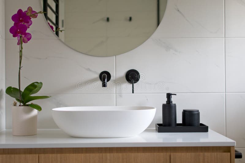 Modern Bathroom with Marble Tiles and Stone Basin. Stock Photo - Image ...