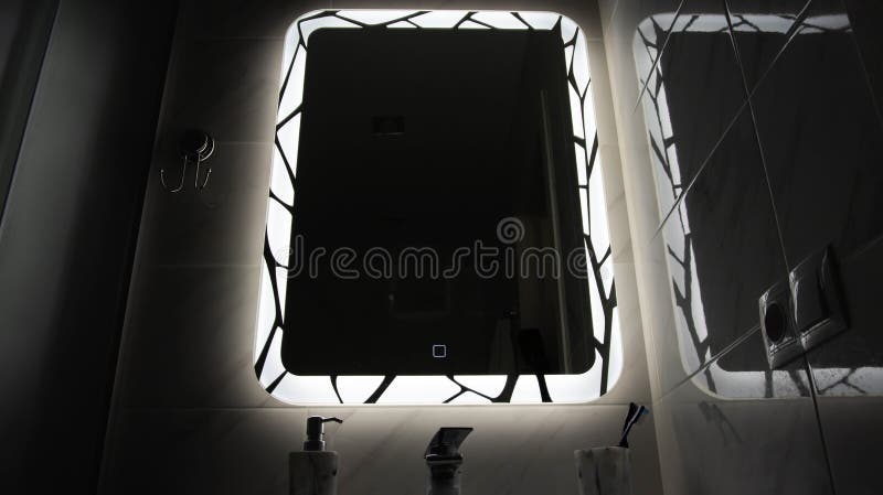 Modern Bathroom Mirror with Light and Touch Button, Close-up Stock ...