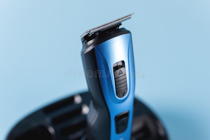 Modern Battery Electric Shaver for Man on Blue Background Horizontal ...