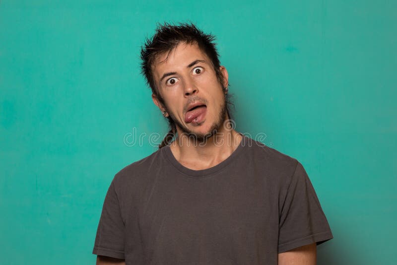 A Modern Bearded Guy Making a Funny Expression. Stock Image - Image of ...