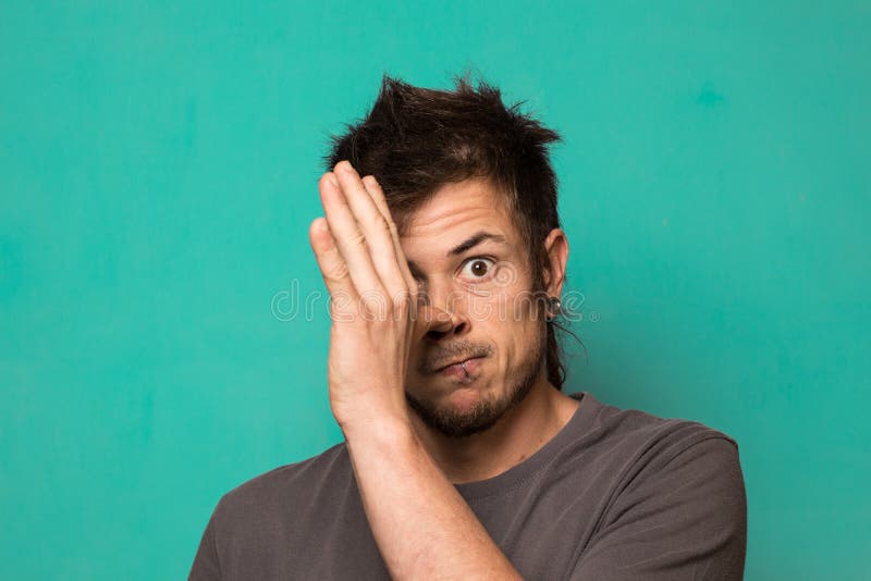 A Modern Bearded Guy Making a Funny Expression. Stock Image - Image of ...
