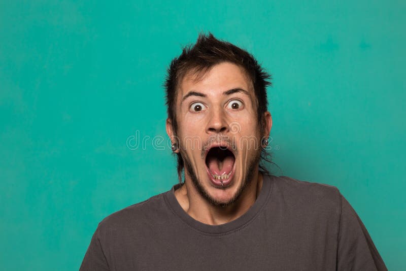 A Modern Bearded Guy Making a Funny Expression. Stock Photo - Image of ...