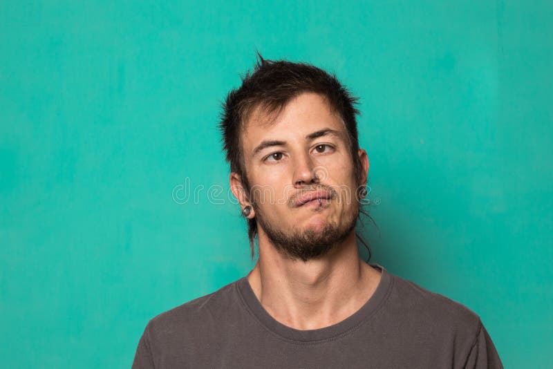 A Modern Bearded Guy Making a Funny Expression. Stock Photo - Image of ...