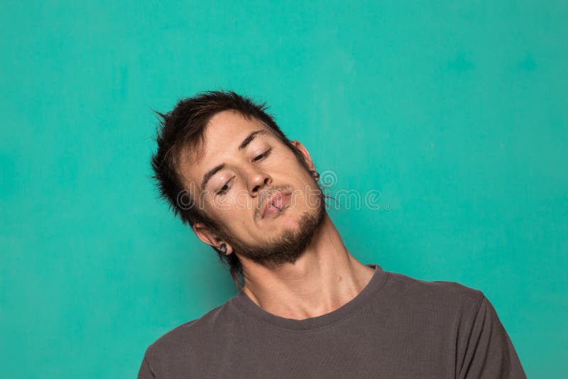 A Modern Bearded Guy Making a Funny Expression. Stock Photo - Image of ...