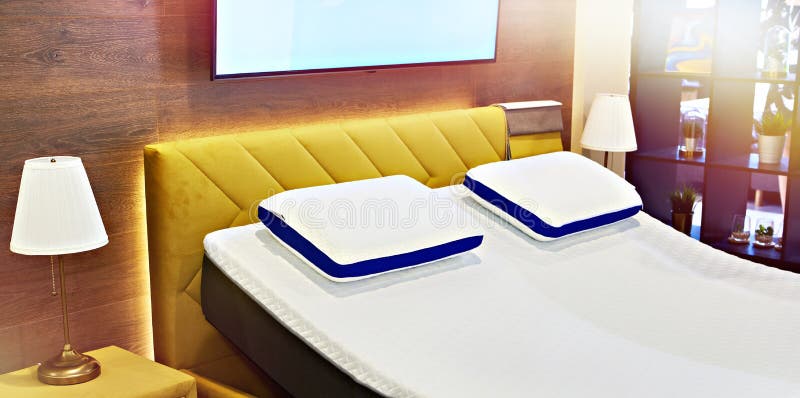 Modern Bed with Mattresses and Pillows in Store Stock Image - Image of ...