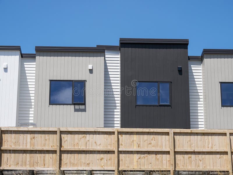 Modern Beige and White Building Facade Black Framed Windows Stock Photo ...