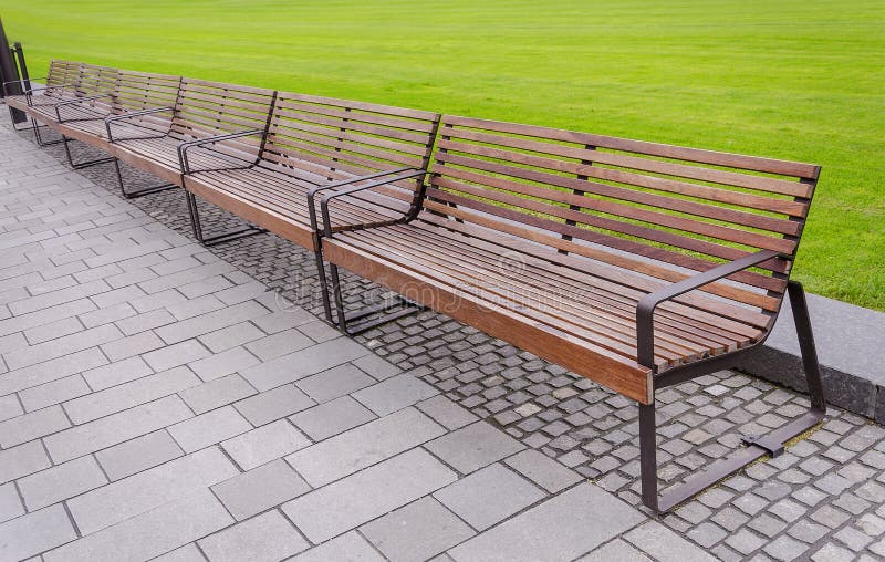 Modern Bench on the Pavement. Stock Photo - Image of bench, empty: 82782116