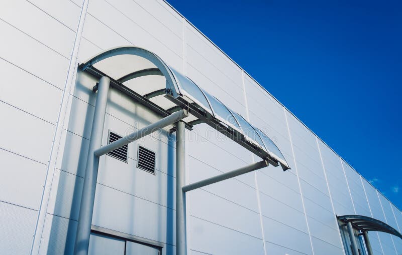 Modern Big Industrial Warehouse Buildings at the Blue Sky Background ...