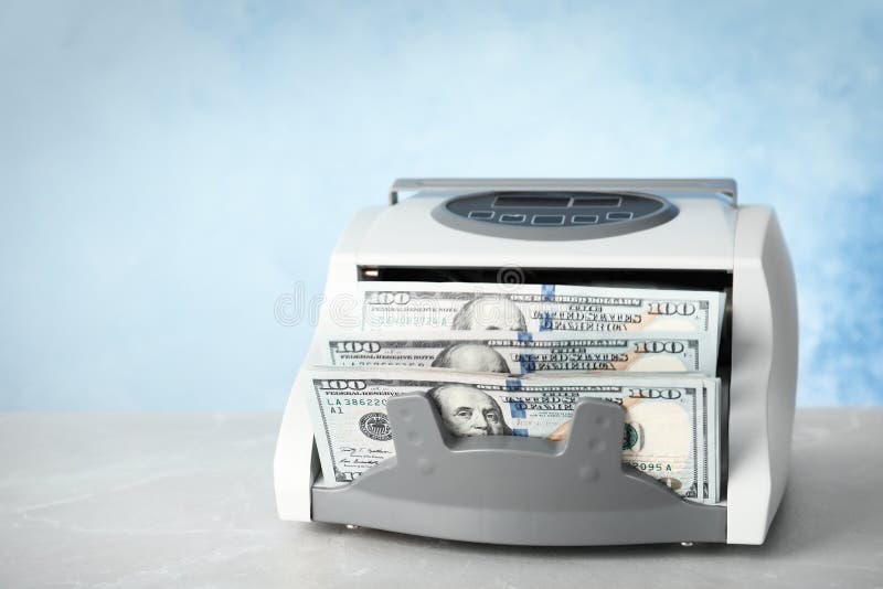 Modern Bill Counter with Money on Table. Stock Photo - Image of ...
