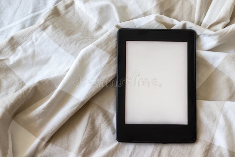 A Modern Black Electronic Book with a Blank Empty Screen on a White and ...