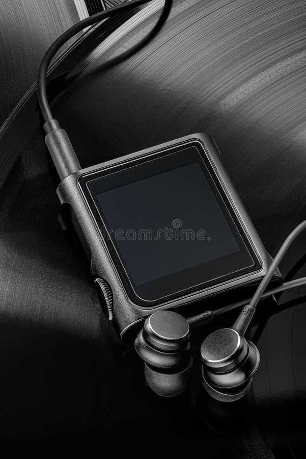 Modern Black MP3 Music Player with Empty Screen on Vinyl Records with ...