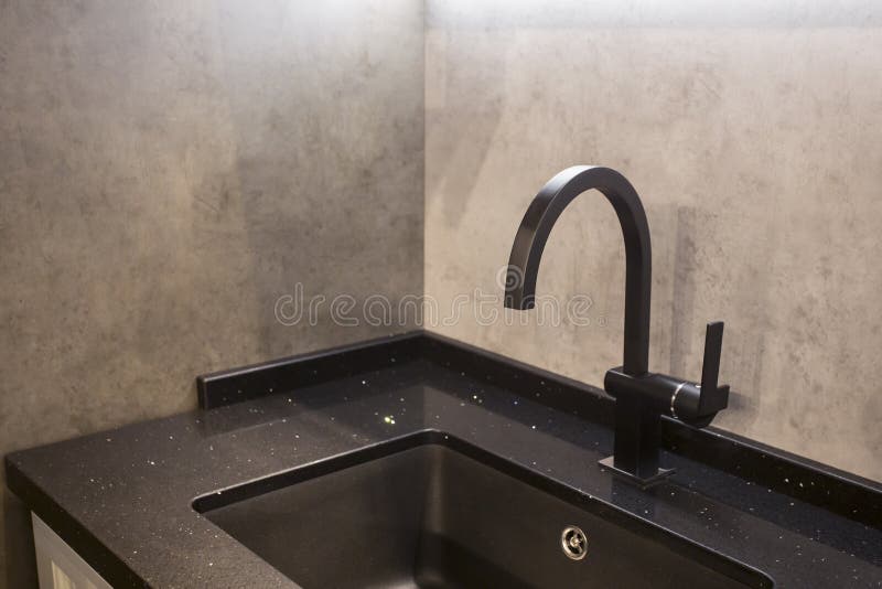 Modern Black Water Tab and Square Sink with Concrete Wall Stock Photo ...