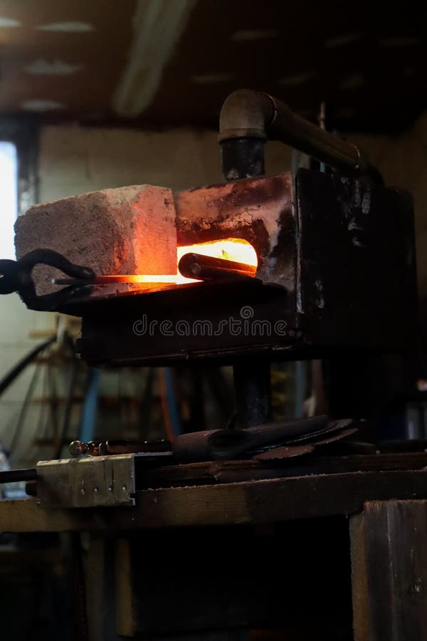Modern Blacksmith Working in His Shop Stock Photo - Image of wheel ...