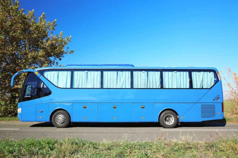 Modern blue bus on road stock photo. Image of driver - 131949446