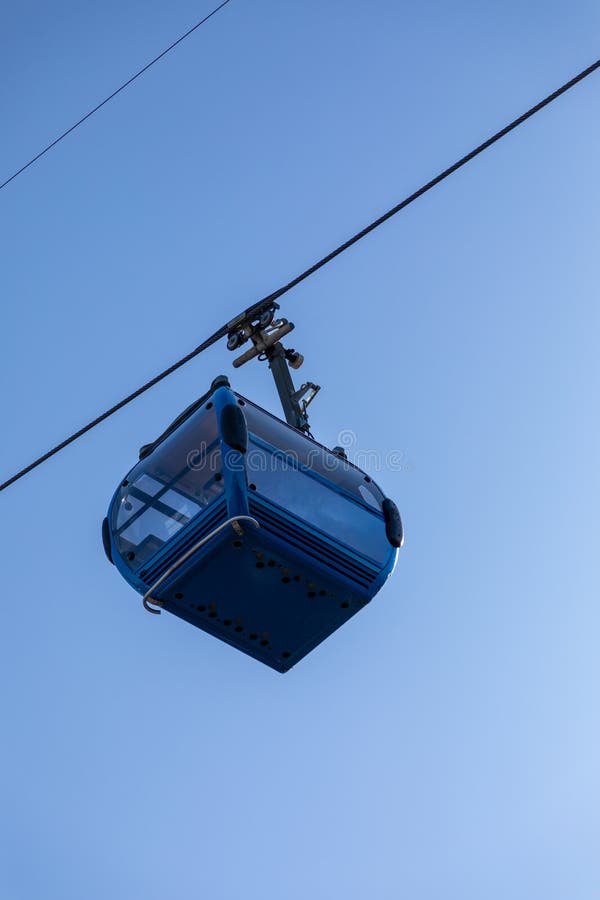 A Modern Blue Cable Car Cabin Suspended on Cables Stock Photo - Image ...