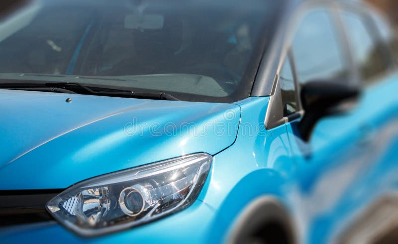 Modern blue car close-up stock photo. Image of rays - 152161898