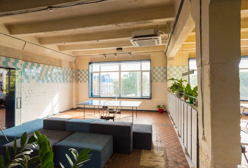 Blue Geometric Loft Sofa in a Design Office Stock Image - Image of ...