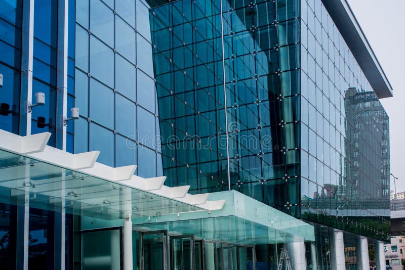 Modern Blue Glass Building Exterior Stock Photo - Image of knot, bank ...