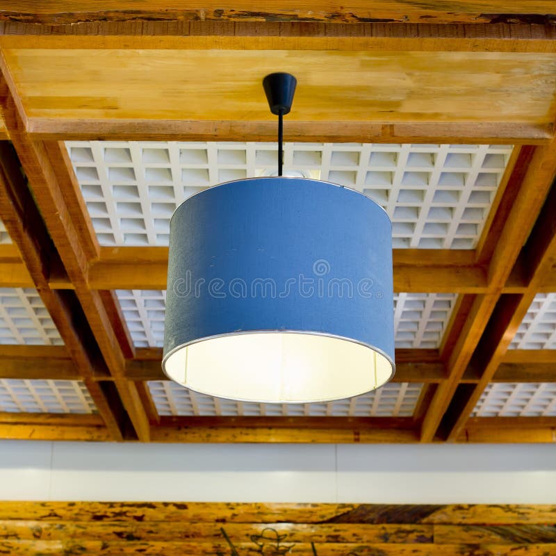 Modern Blue Hanging Lamp on Wooden Ceiling Stock Photo - Image of blue ...