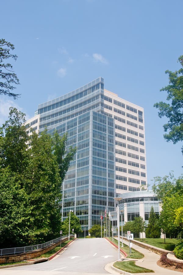 Modern Blue and White Glass Building Up Driveway Stock Photo - Image of ...