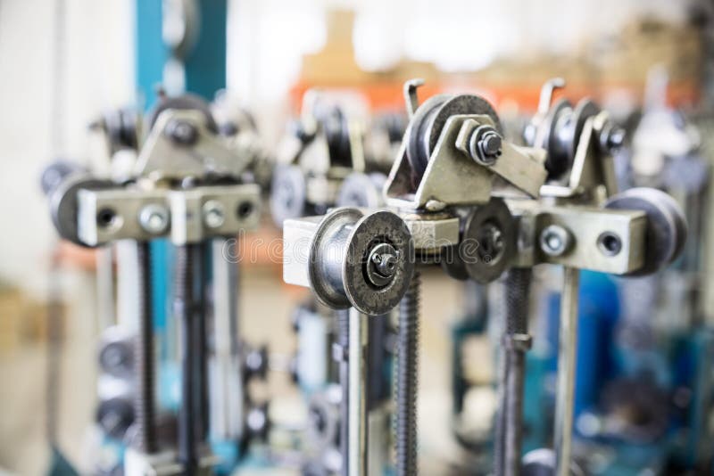 The Mechanism of a Braiding Machine Close-up. Stock Photo - Image of ...