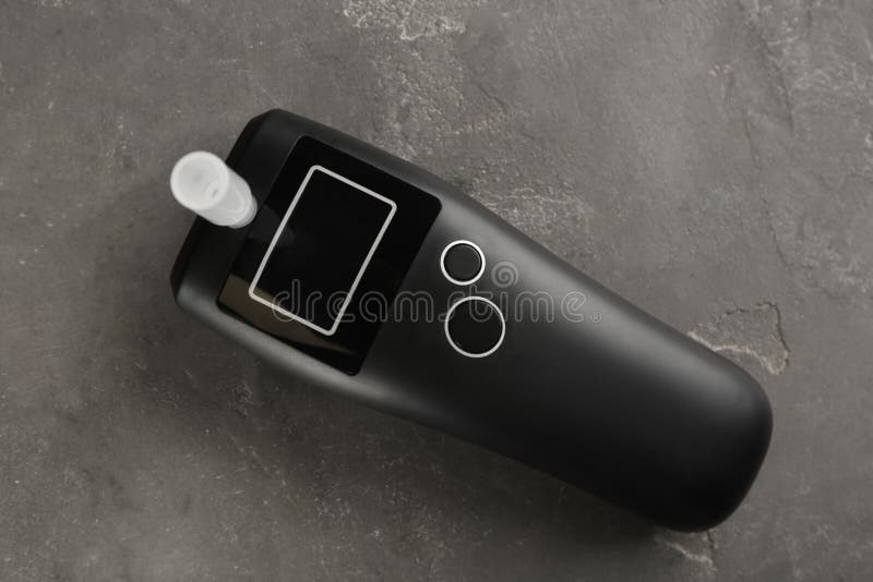 Modern Breathalyzer with Blank Screen on Grey Stone Table, Top View ...
