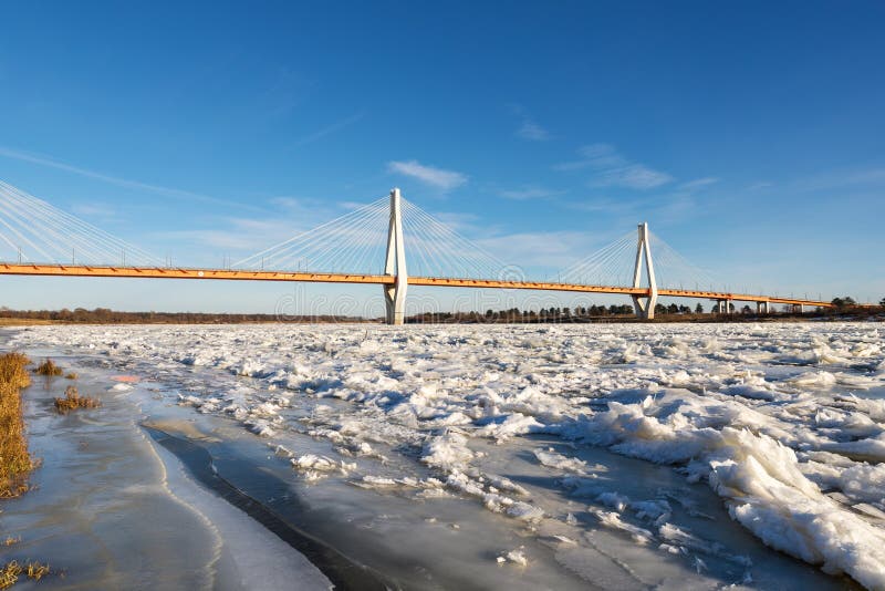 Modern Bridge Over the Frozen River Stock Image - Image of freezing ...