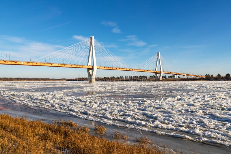 Modern Bridge Over the Frozen River Stock Image - Image of bridgework ...