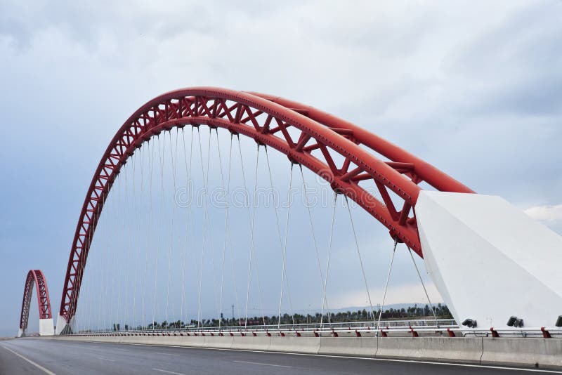 Modern Bridge with Red Arches Stock Image - Image of asphalt, curve ...