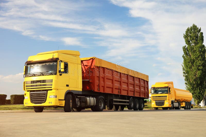 Modern Bright Trucks Parked on Road Stock Photo - Image of outdoors ...