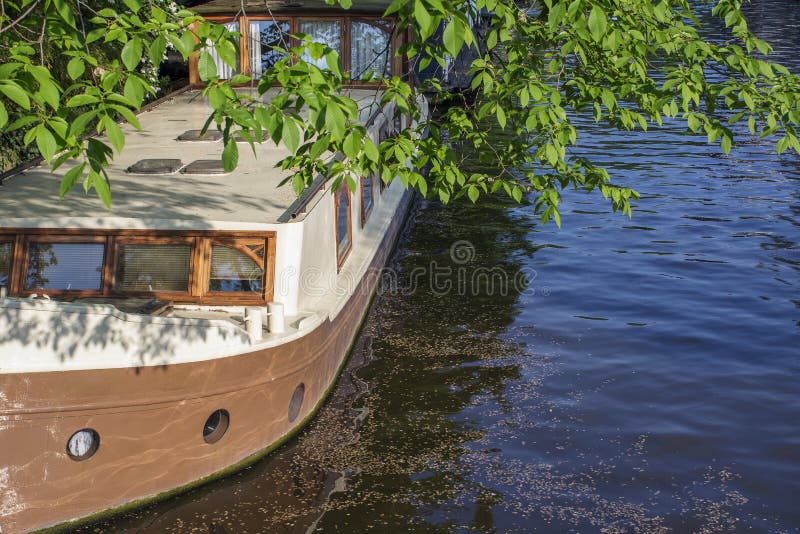 Brown Boat on the Blue Water Near the Mountains Stock Photo - Image of ...