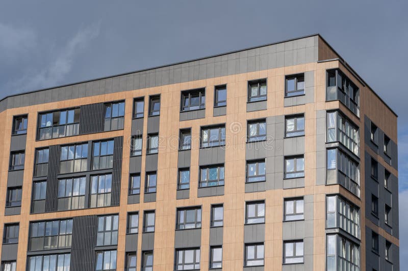 Modern Brown Building Facade with Shiny Mirror Windows Stock Image ...