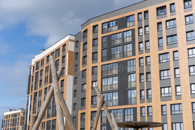 Modern Brown Building Facade with Shiny Mirror Windows Stock Image ...