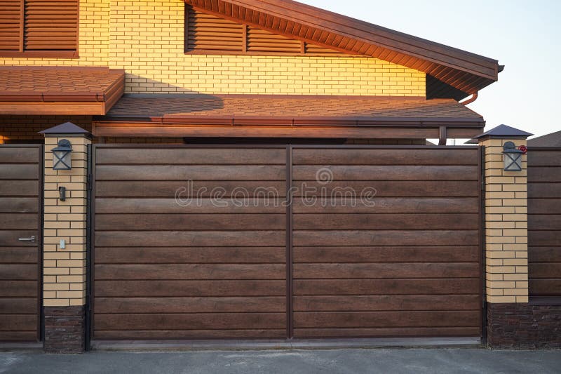 Modern Brown Metal and PVC Plastic Gates Stock Image - Image of steel ...