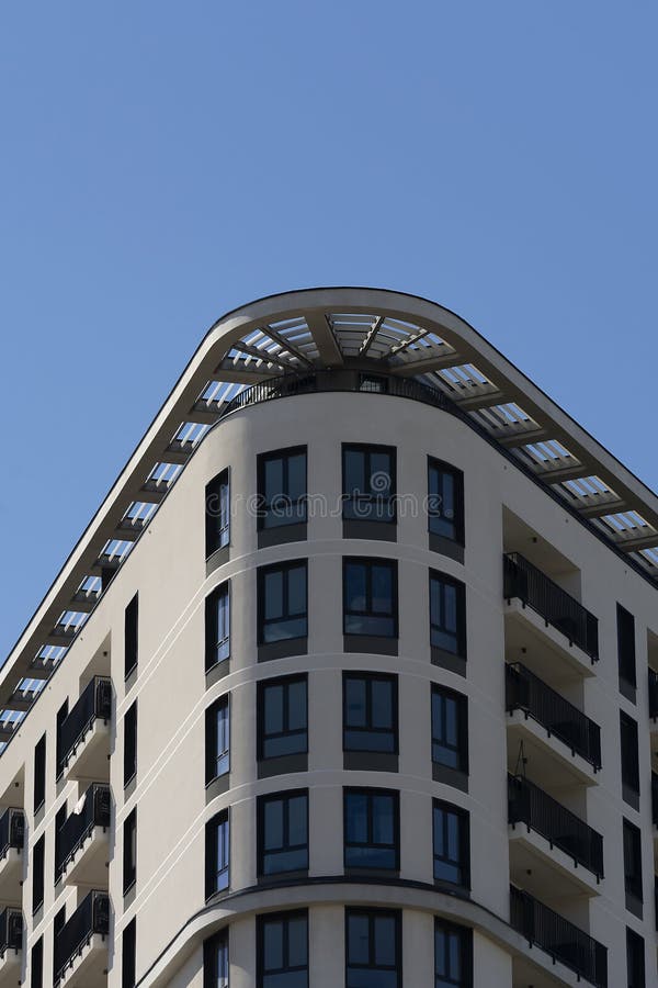 Modern building stock image. Image of blue, grid, balconies - 338474523