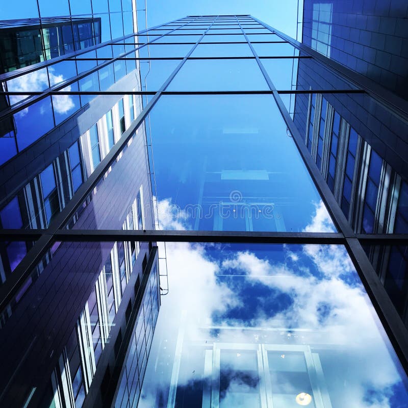 Modern Building with Blue Sky and Cloud Reflections Stock Photo - Image ...
