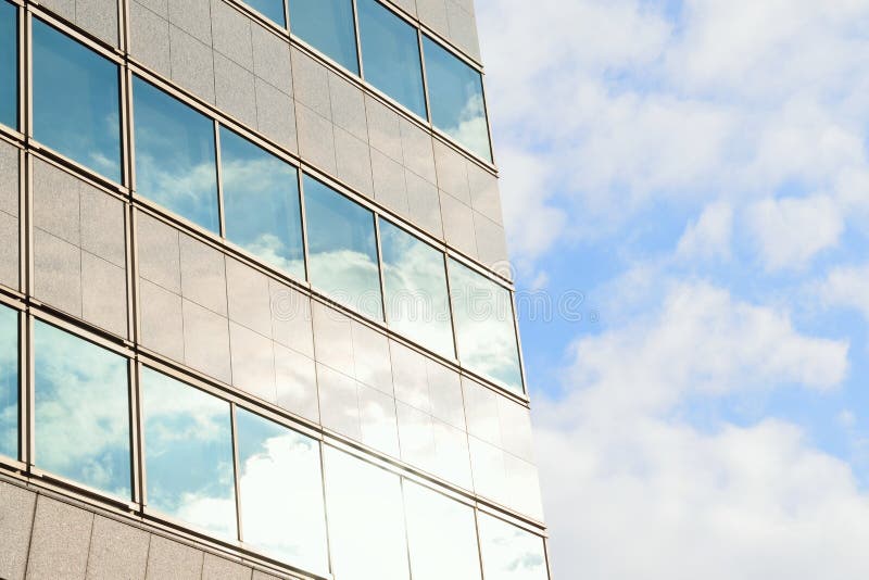 Modern Building with Clouds & Sunshine in Horizontal Frame Stock Image ...