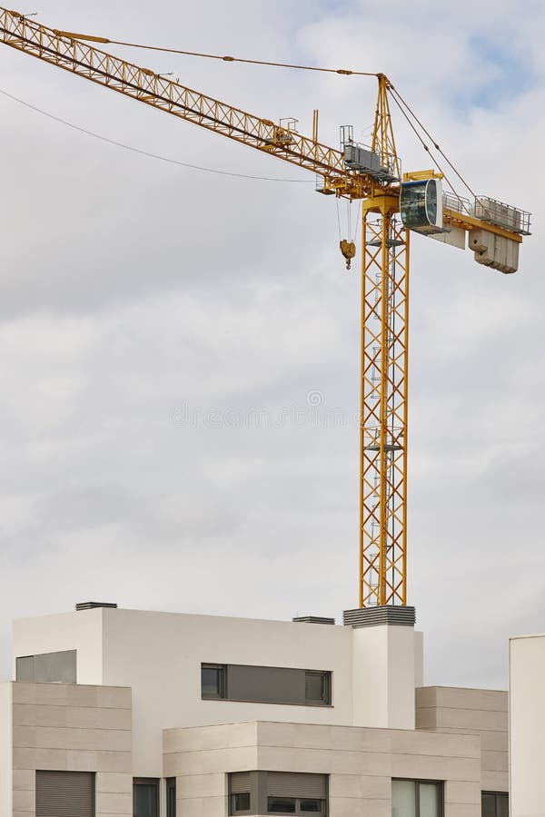 Modern Building and Crane Machinery Structure. Construction Industry ...